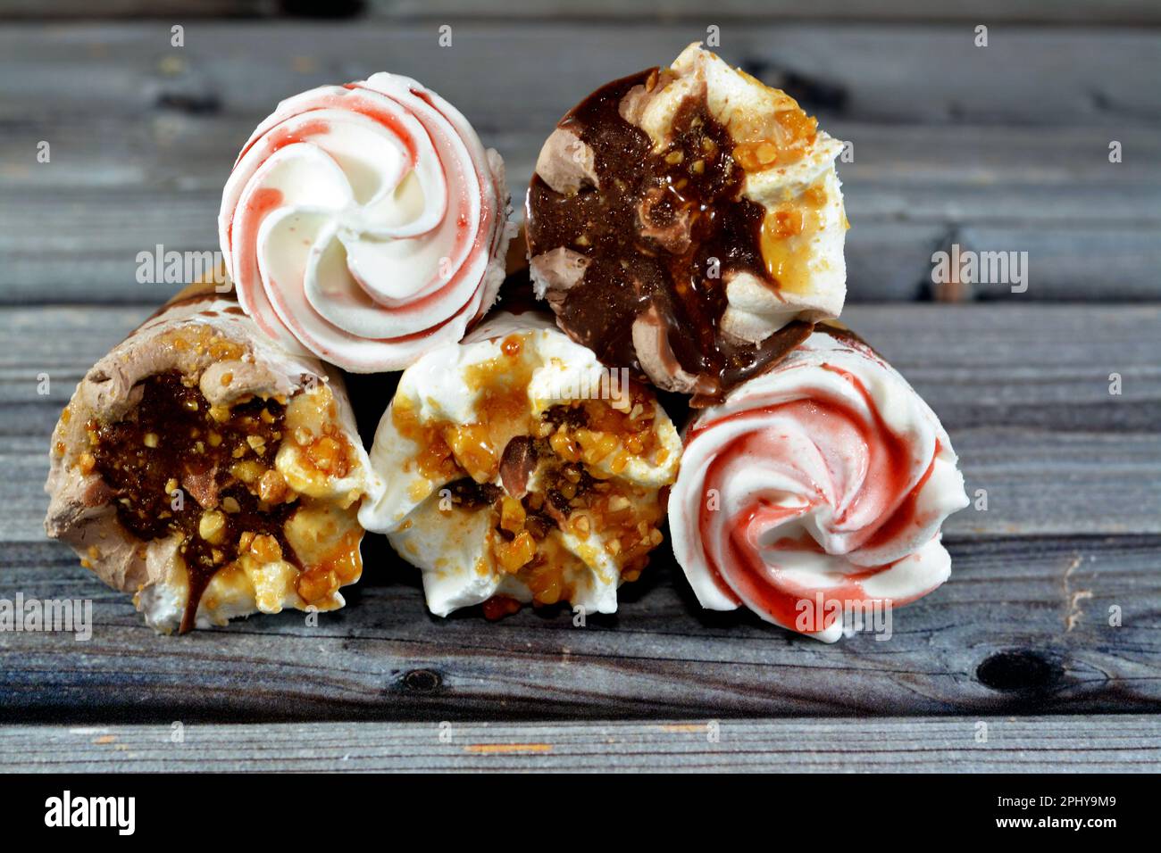 Ice cream vanilla and chocolate cones with topping of chocolate and ...