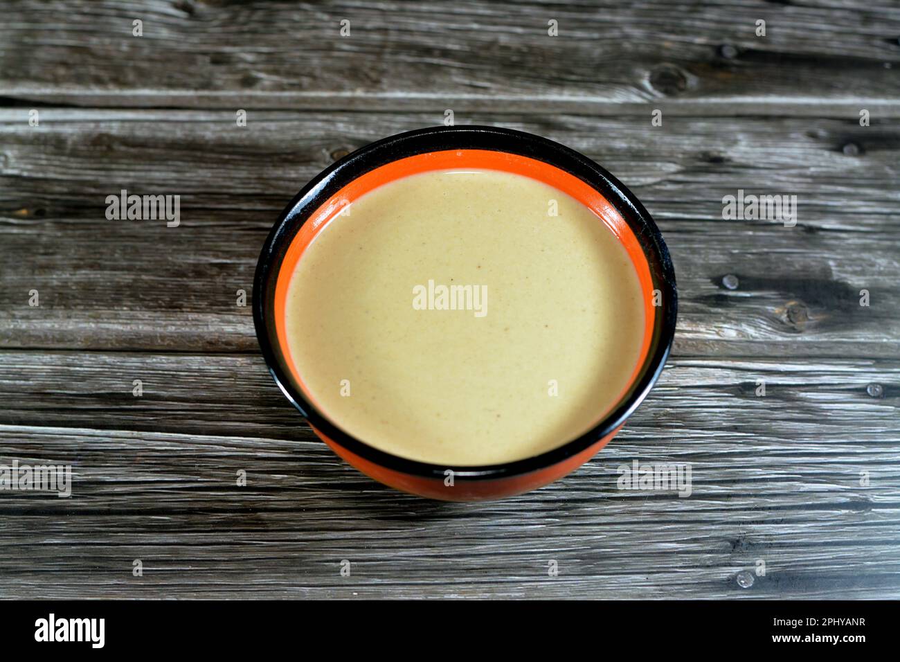 Bowl of Tahini Tahina which is a Middle Eastern condiment made from ...