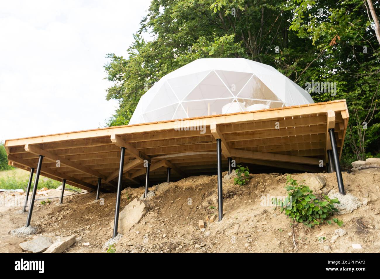 the process of building a dome tent in the mountains Stock Photo - Alamy