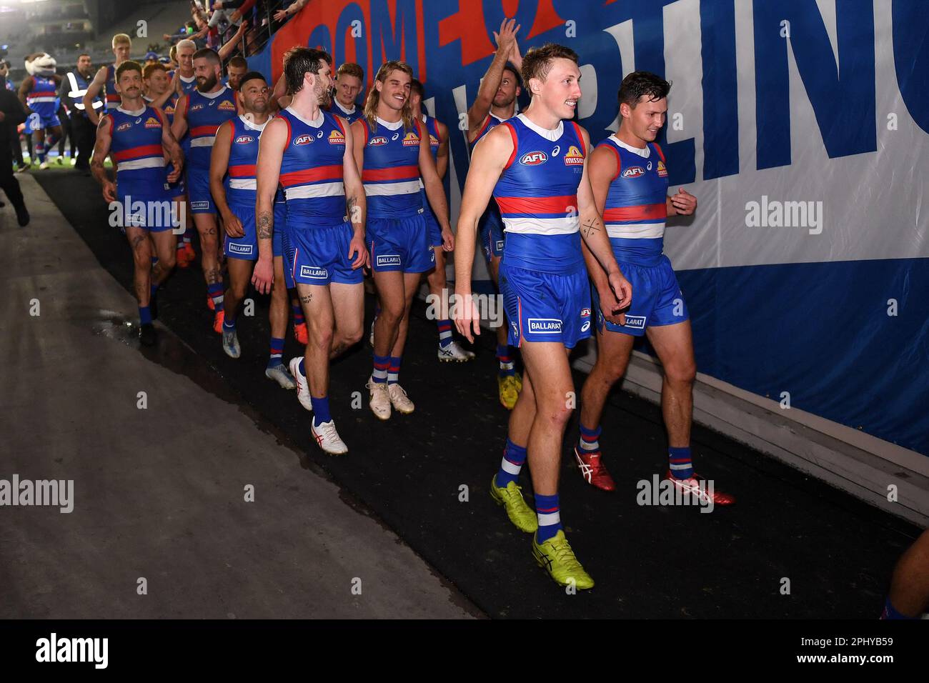 Bailey Dale of the Bulldogs celebrates victory following the AFL Round ...