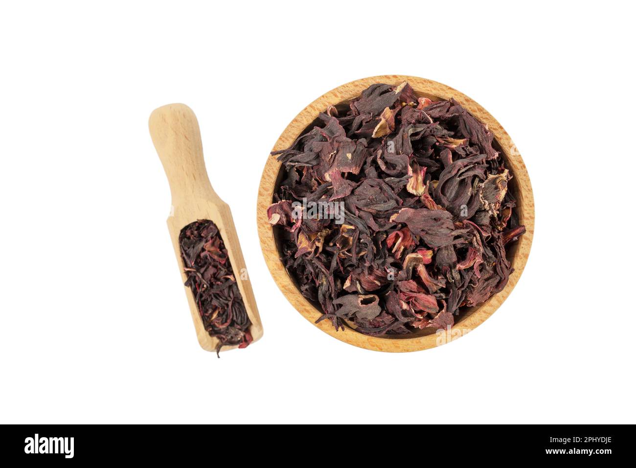 Dry hibiscus tea in wooden bowl and scoop isolated on white background. herb. herbal tea. food ...