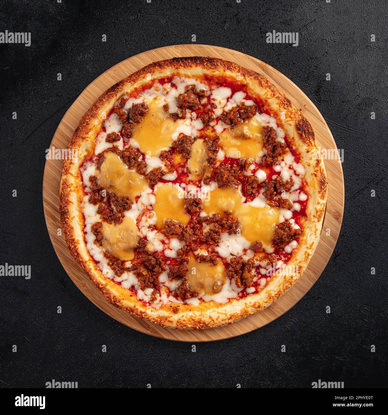 Pizza with cheddar cheese and minced beef Stock Photo - Alamy