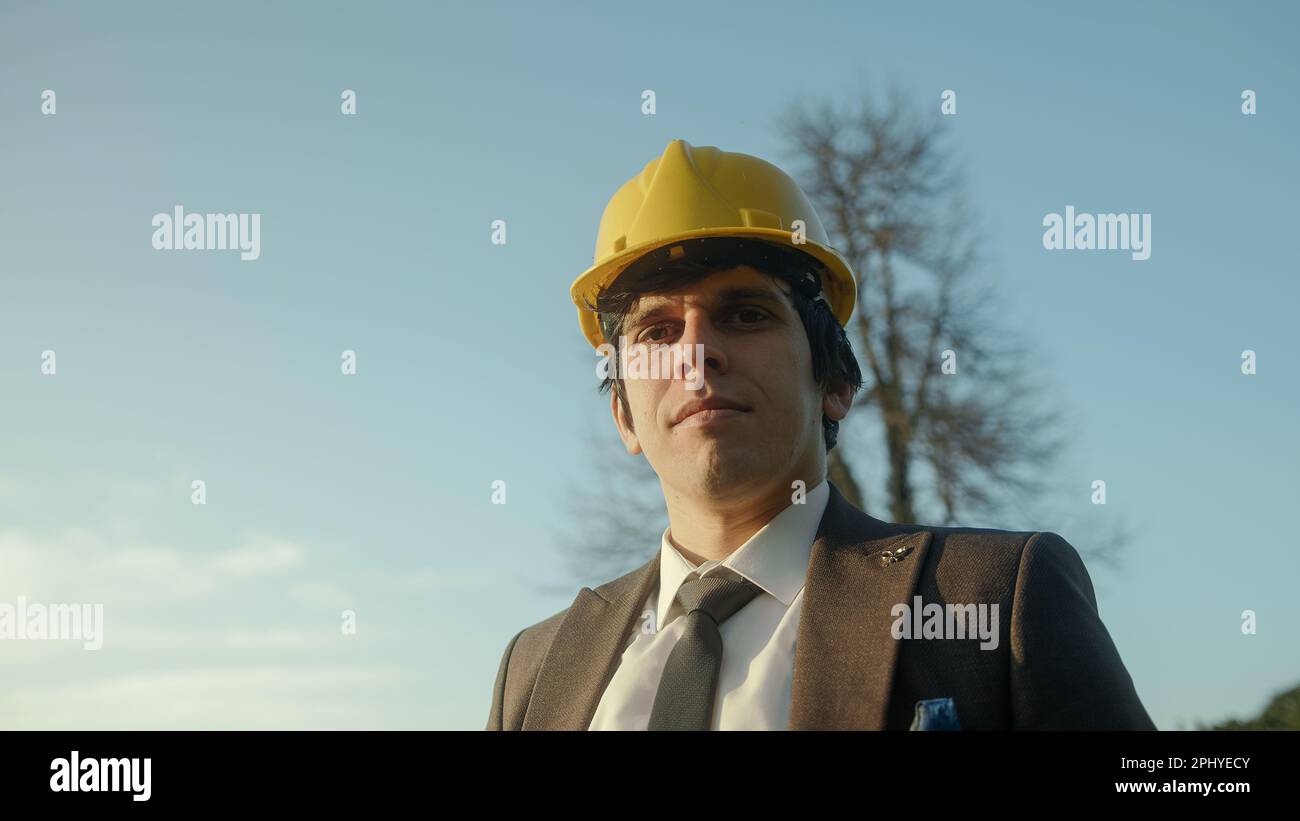Smiling Young Construction Engineer or Contractor in Hard Hat and Suit ...