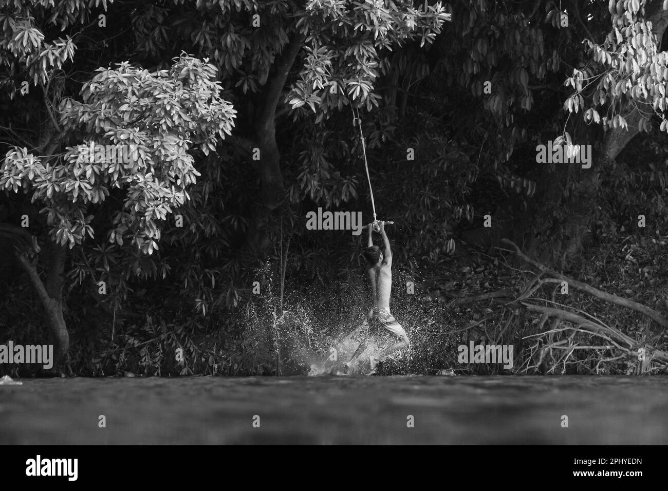 A swing into the deep Stock Photo - Alamy