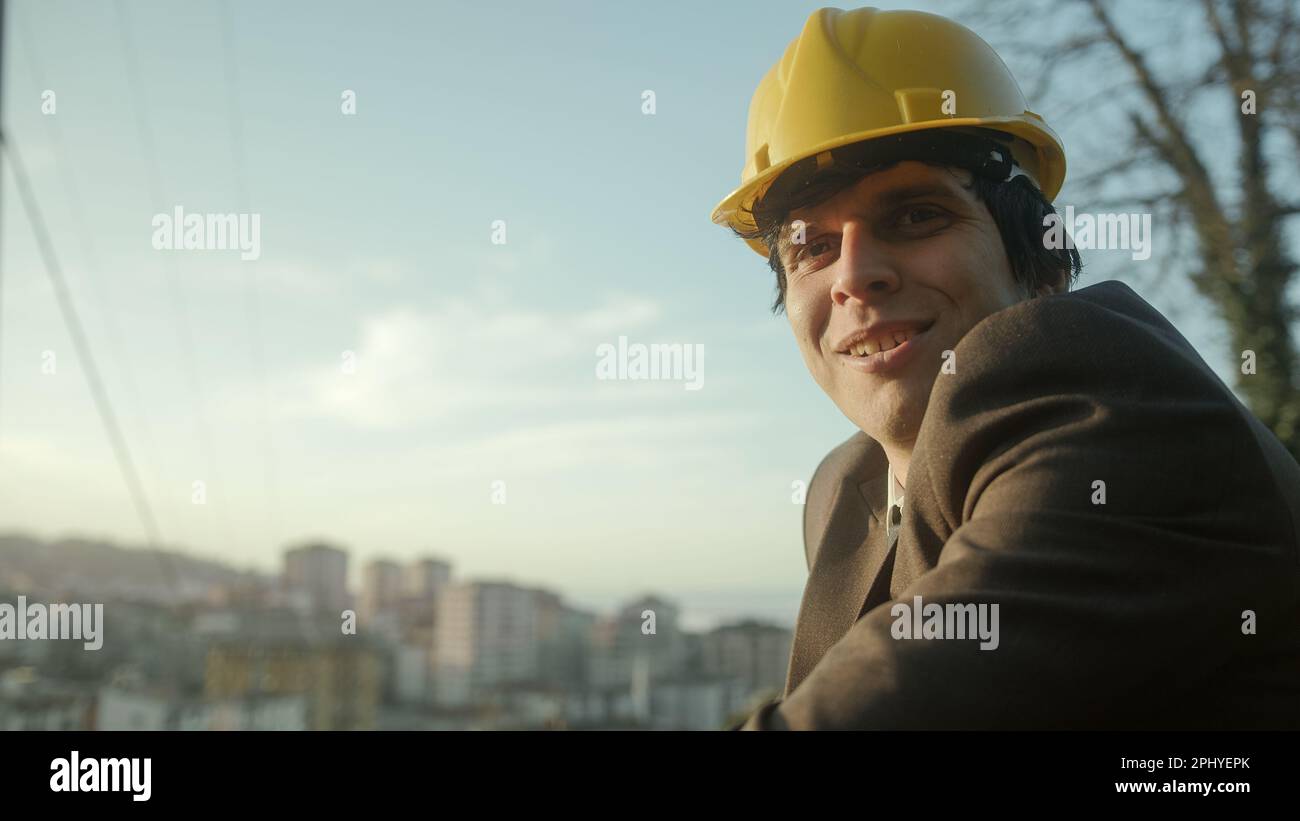 Construction engineer or contractor, wearing a hard hat and suit ...