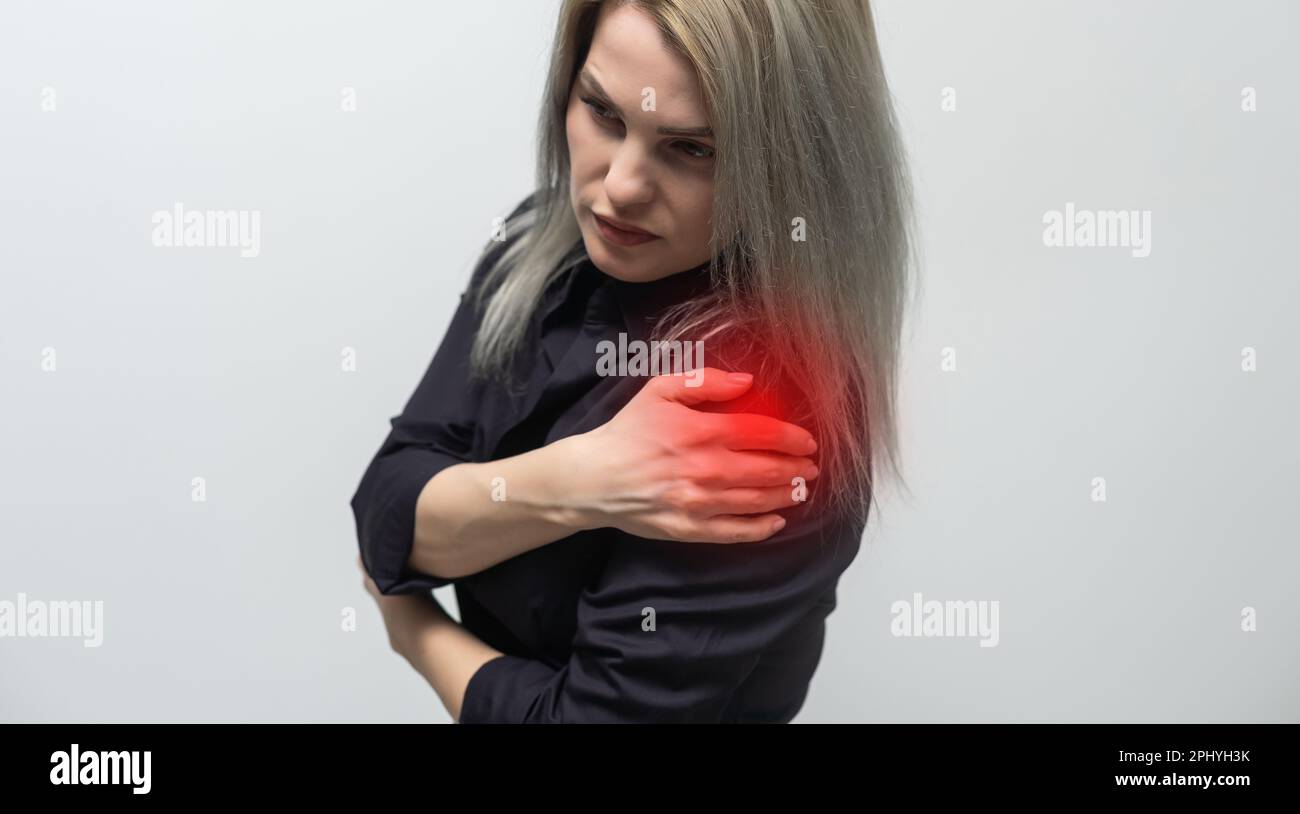 Wrist pain. Painful hand with red spot closeup. Sprain, fracture ...