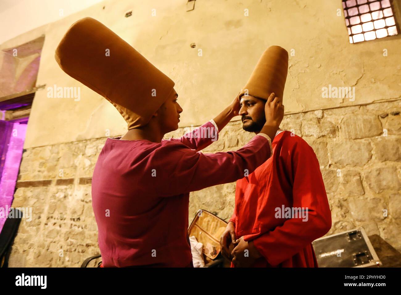 Cairo, Egypt. 29th Mar, 2023. Dancers prepare for Sufi dance ...