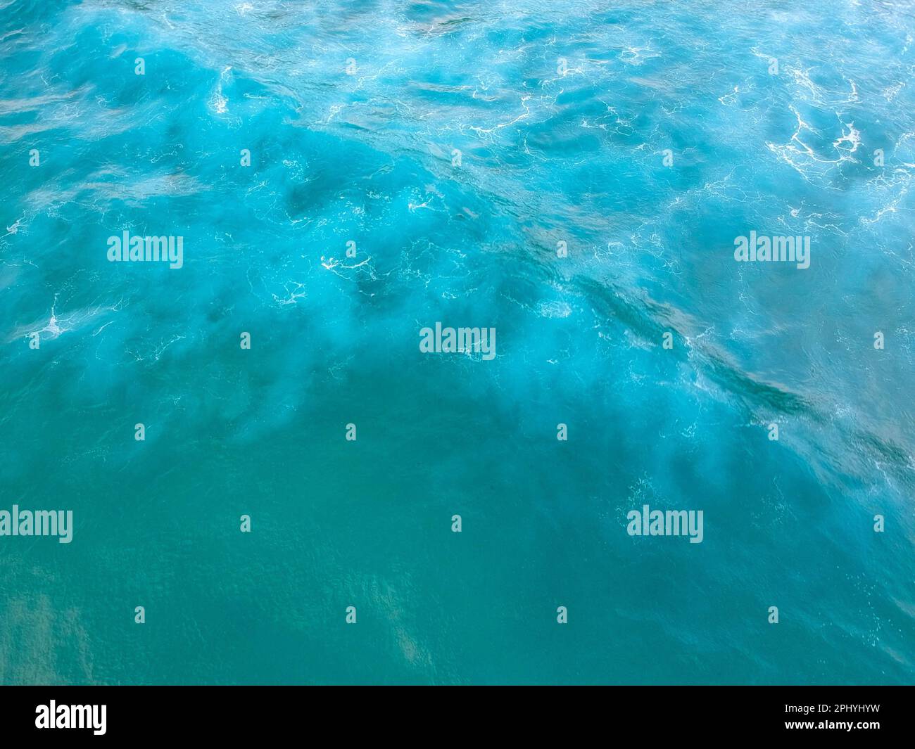 An aerial view of calm waves of the crystal clear sea Stock Photo - Alamy