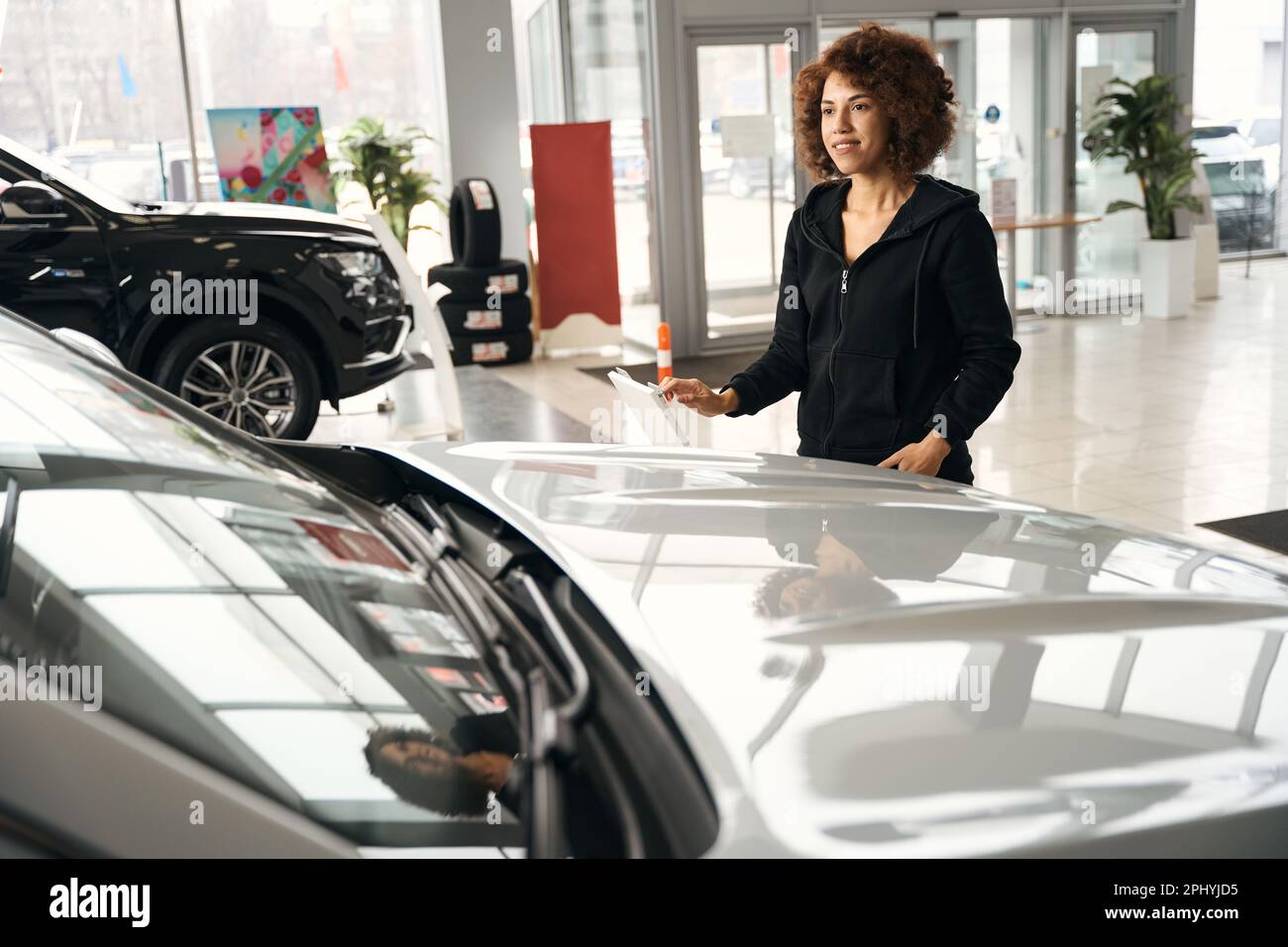 Woman specialist stands uses hi-res stock photography and images - Alamy