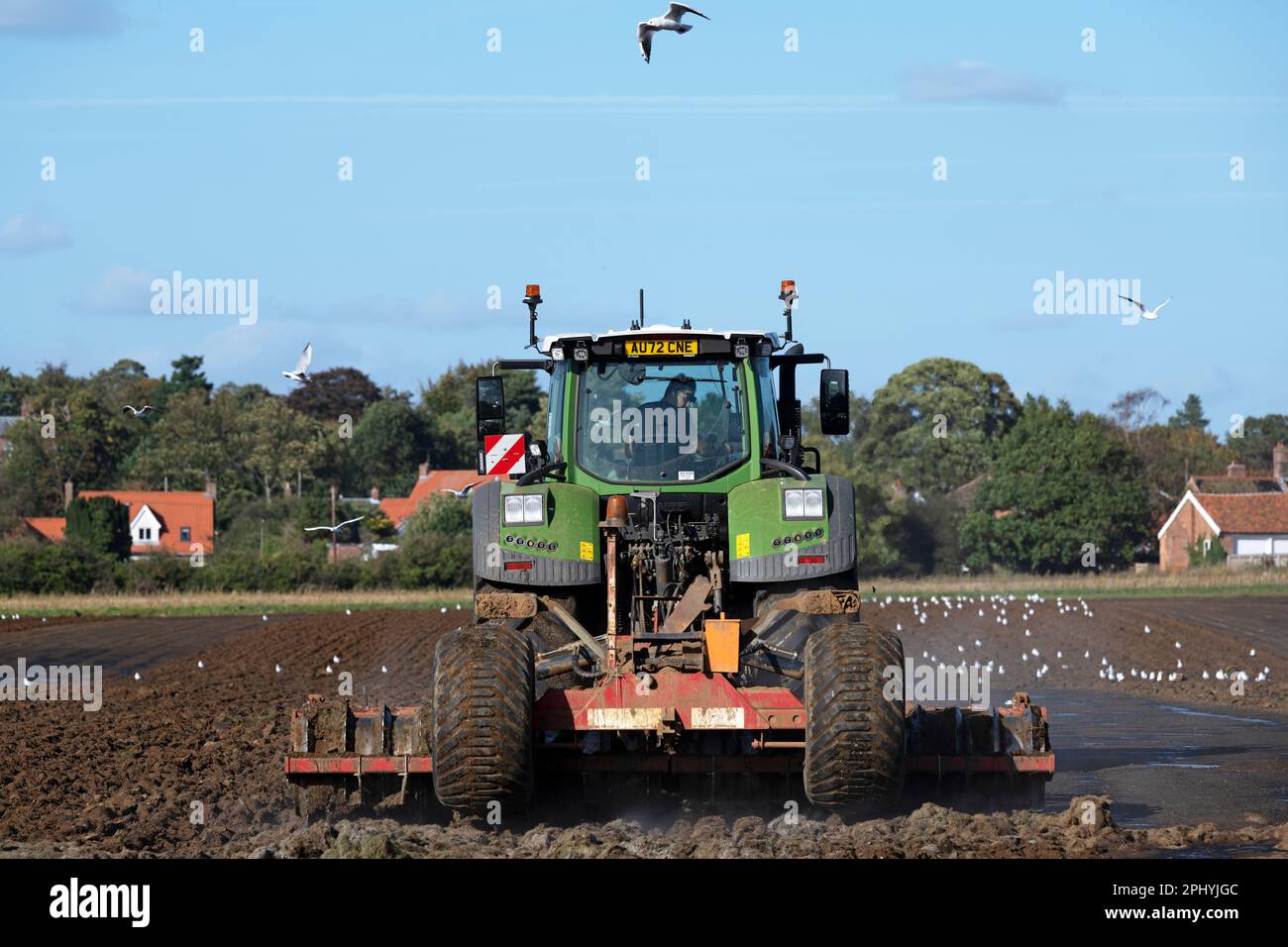 Heavy discing on wet land Alderton Suffolk UK Stock Photo - Alamy