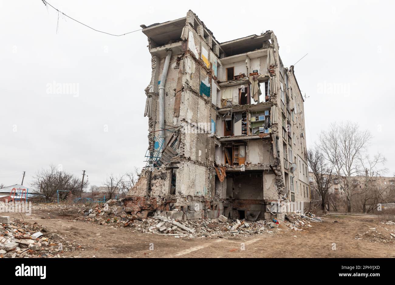 An apartment block destroyed in an explosion caused by rocket fire in ...