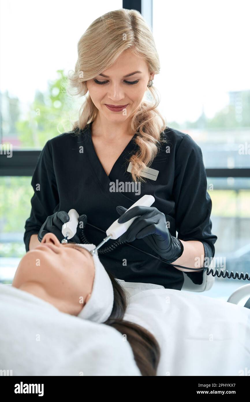 Dermatologist working doing skin hi-res stock photography and images ...