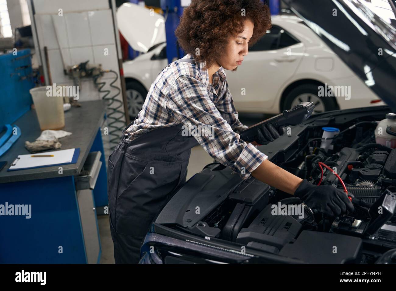 Modern procedure of computer diagnostics car in car repair shop Stock ...