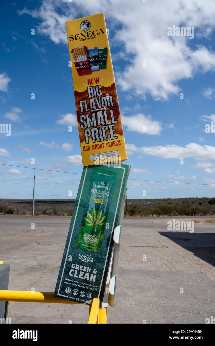 Cardboard sign advertising flavored hemp and tobacco wraps made by ...
