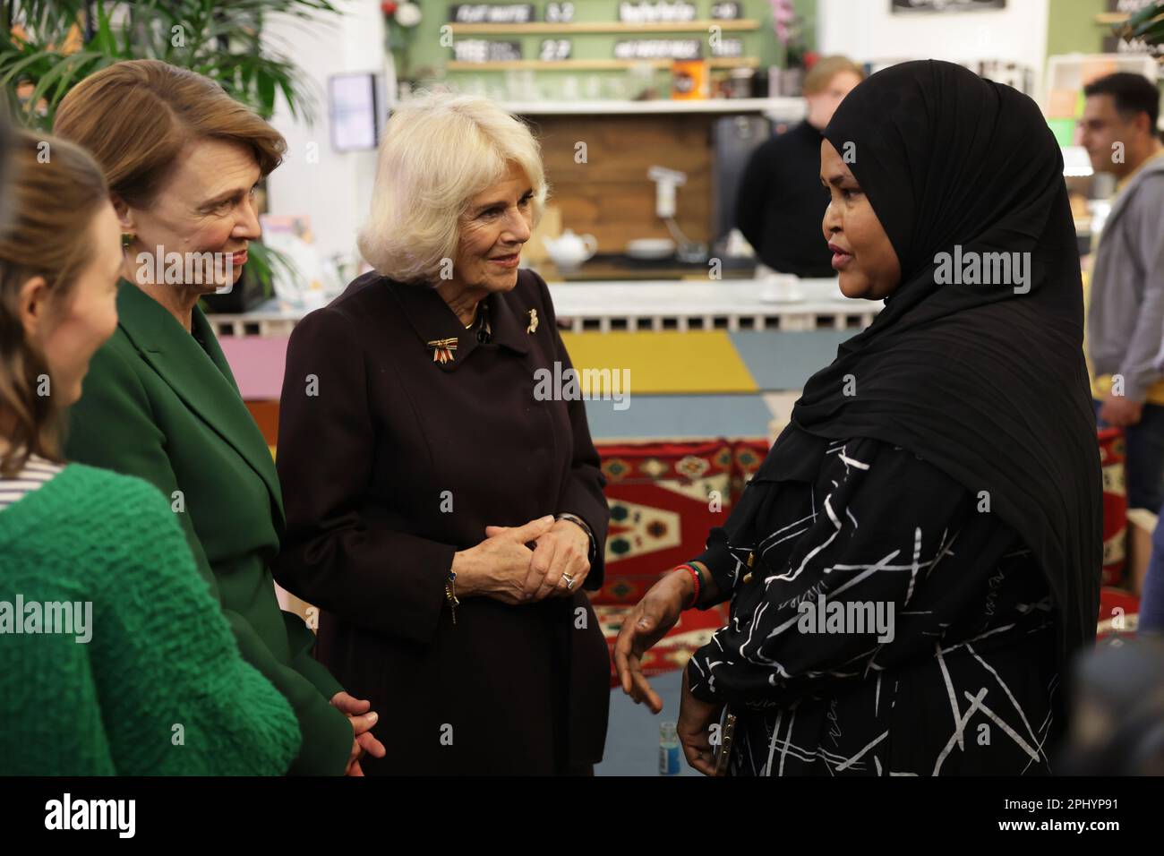 The Queen Consort and First Lady Elke Budenbender speak with Ms. Shukri ...