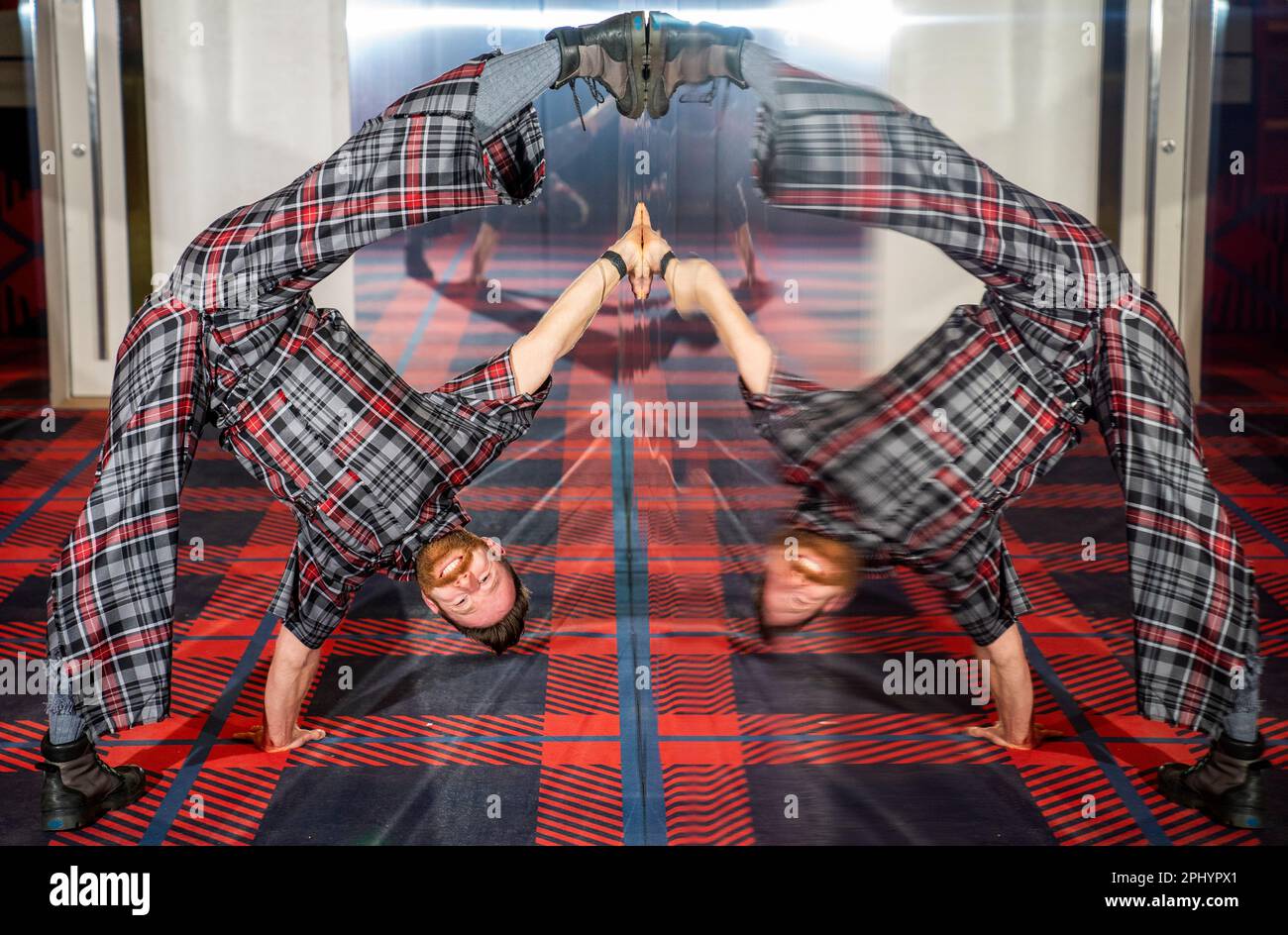 Yoga teacher Finlay Wilson wears the Kilted Yoga tartan during a ...