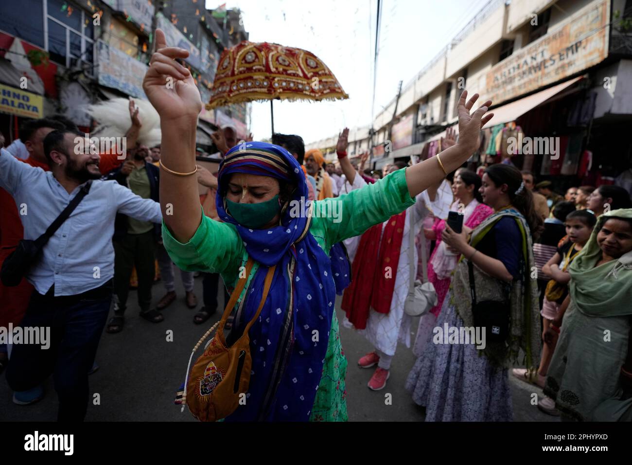 Devotees participate in a procession marking the Hindu festival of Ram ...