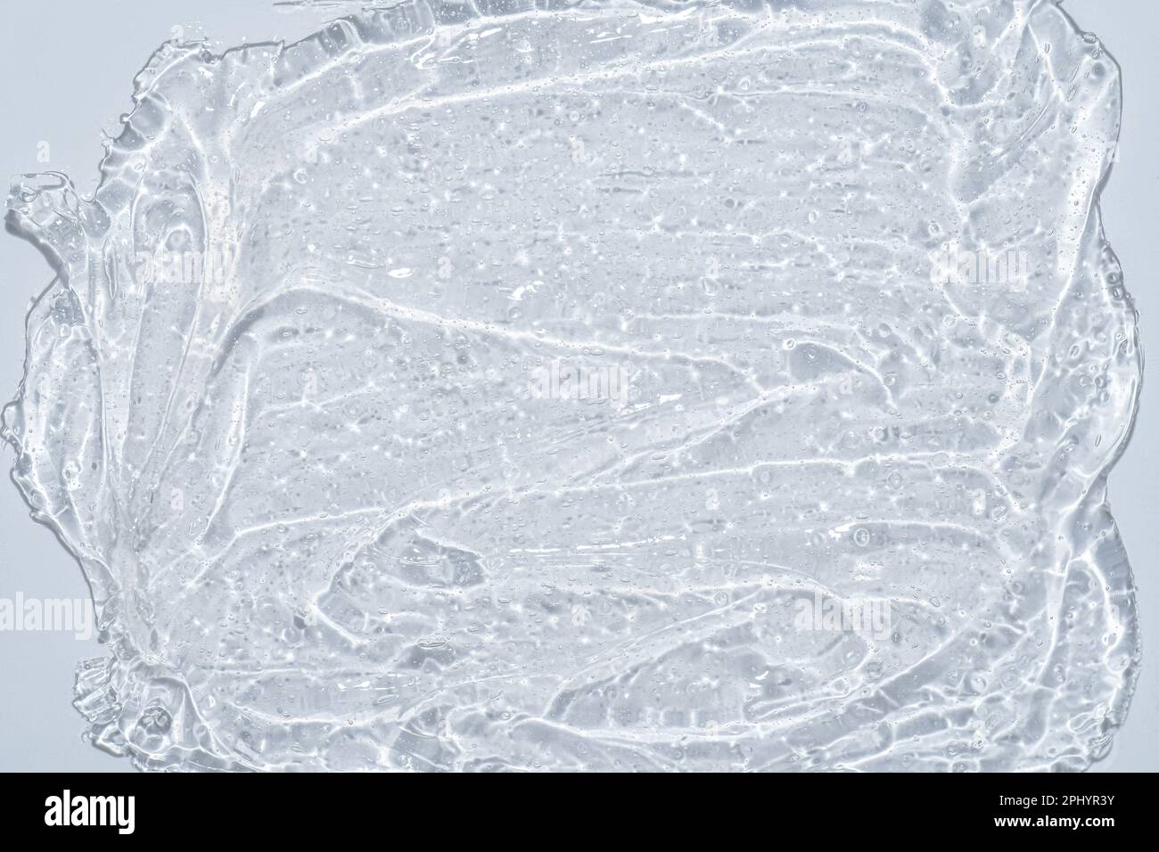 Dynamic clear gel swatch splash with air bubbles. Hydrating face cream ...