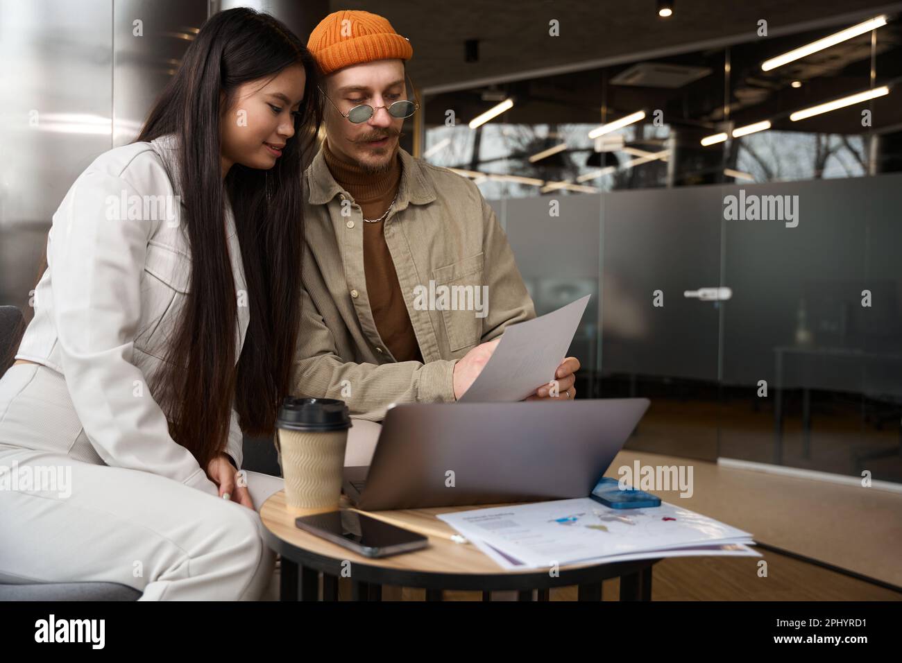 Focused office workers dealing with business documentation Stock Photo ...