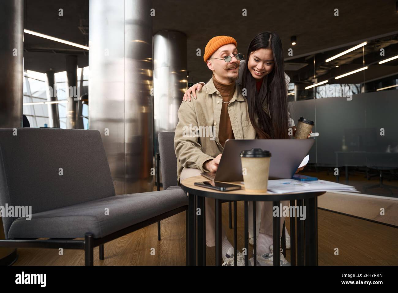 Two company employees working on new project Stock Photo - Alamy