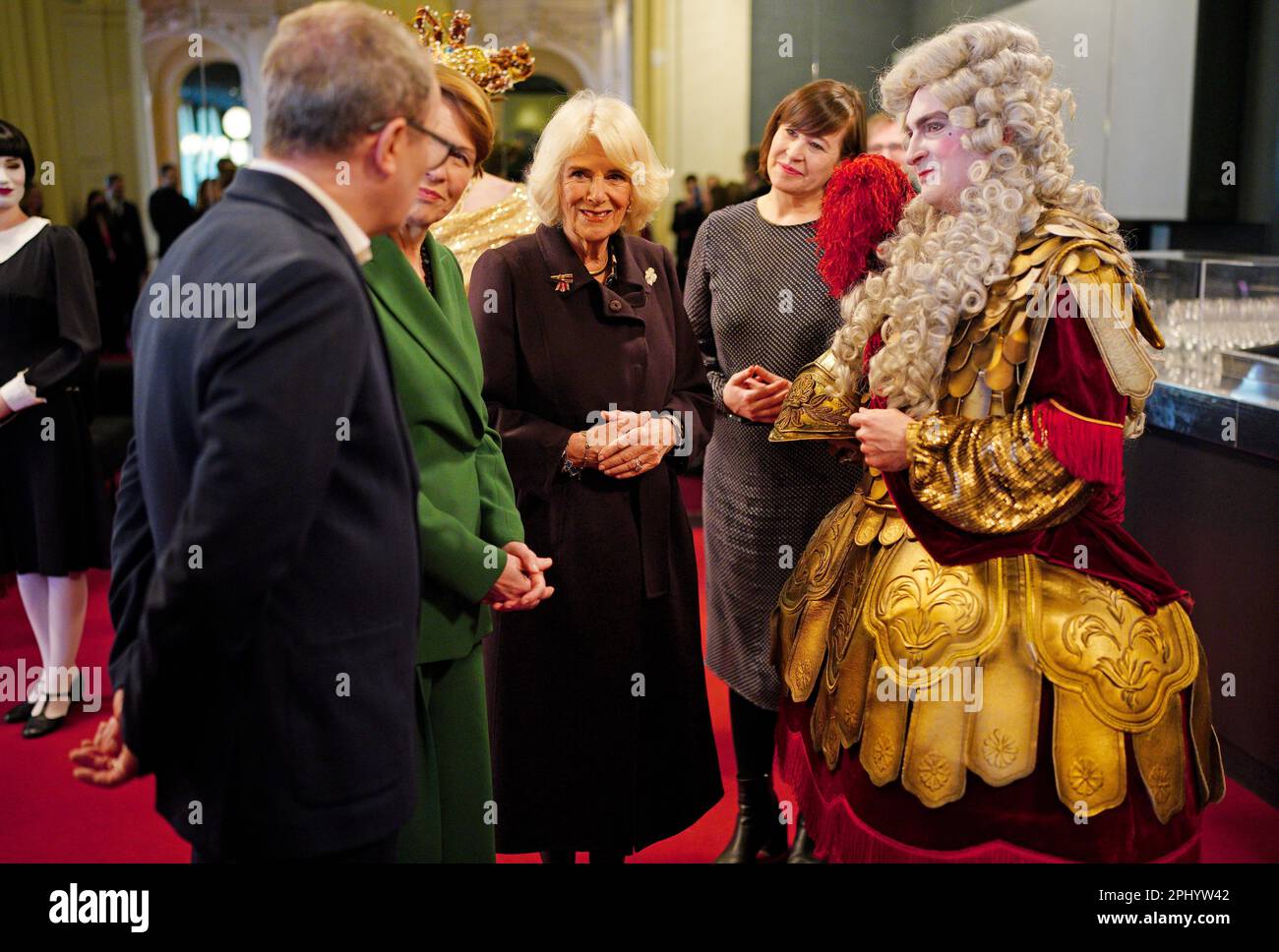 The Queen Consort (centre) and First Lady Elke Budenbender (second left ...