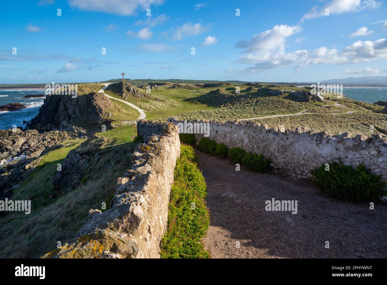 Path down from Twr Mawr lighthouse with view of one of the crosses and ...