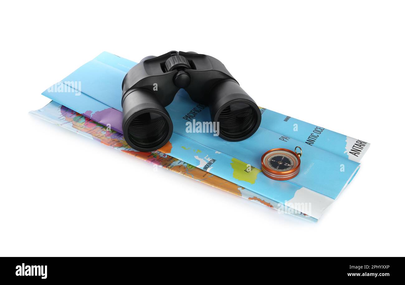Modern binoculars, compass and map on white background Stock Photo - Alamy