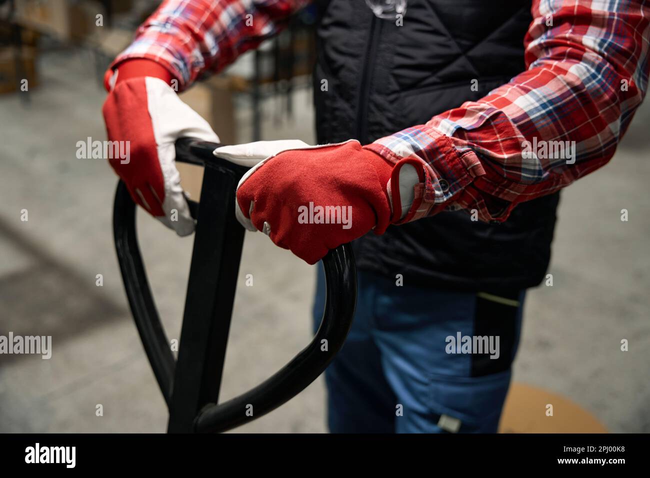 Male using trolley to working in the factory Stock Photo - Alamy