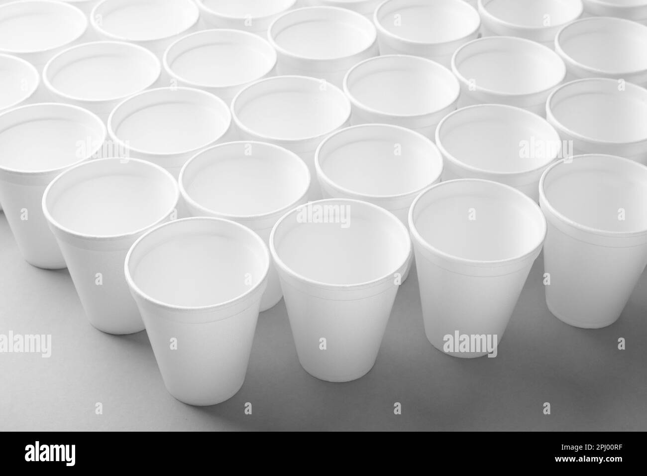 Many styrofoam cups on light grey background, closeup Stock Photo - Alamy