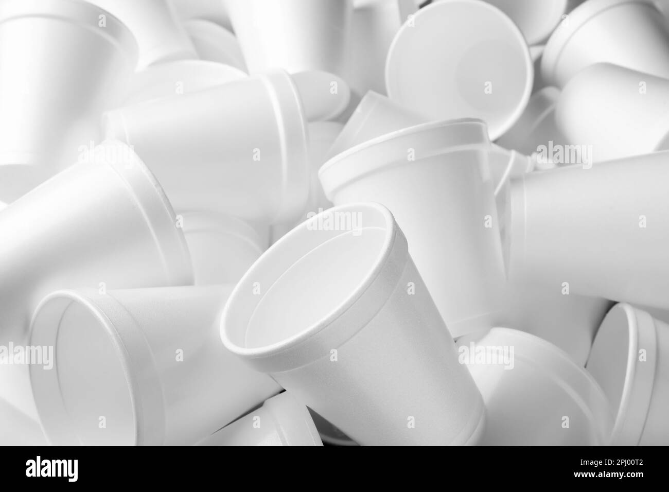 Heap of white styrofoam cups as background, closeup Stock Photo - Alamy
