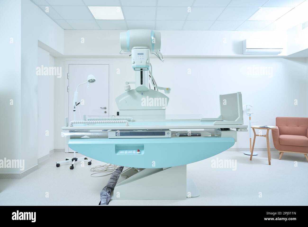 X-ray room with modern X-ray machine in clinic Stock Photo - Alamy