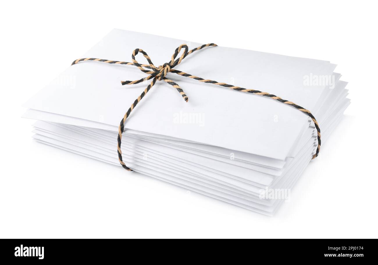 Stack of letters wrapped with rope on white background Stock Photo - Alamy