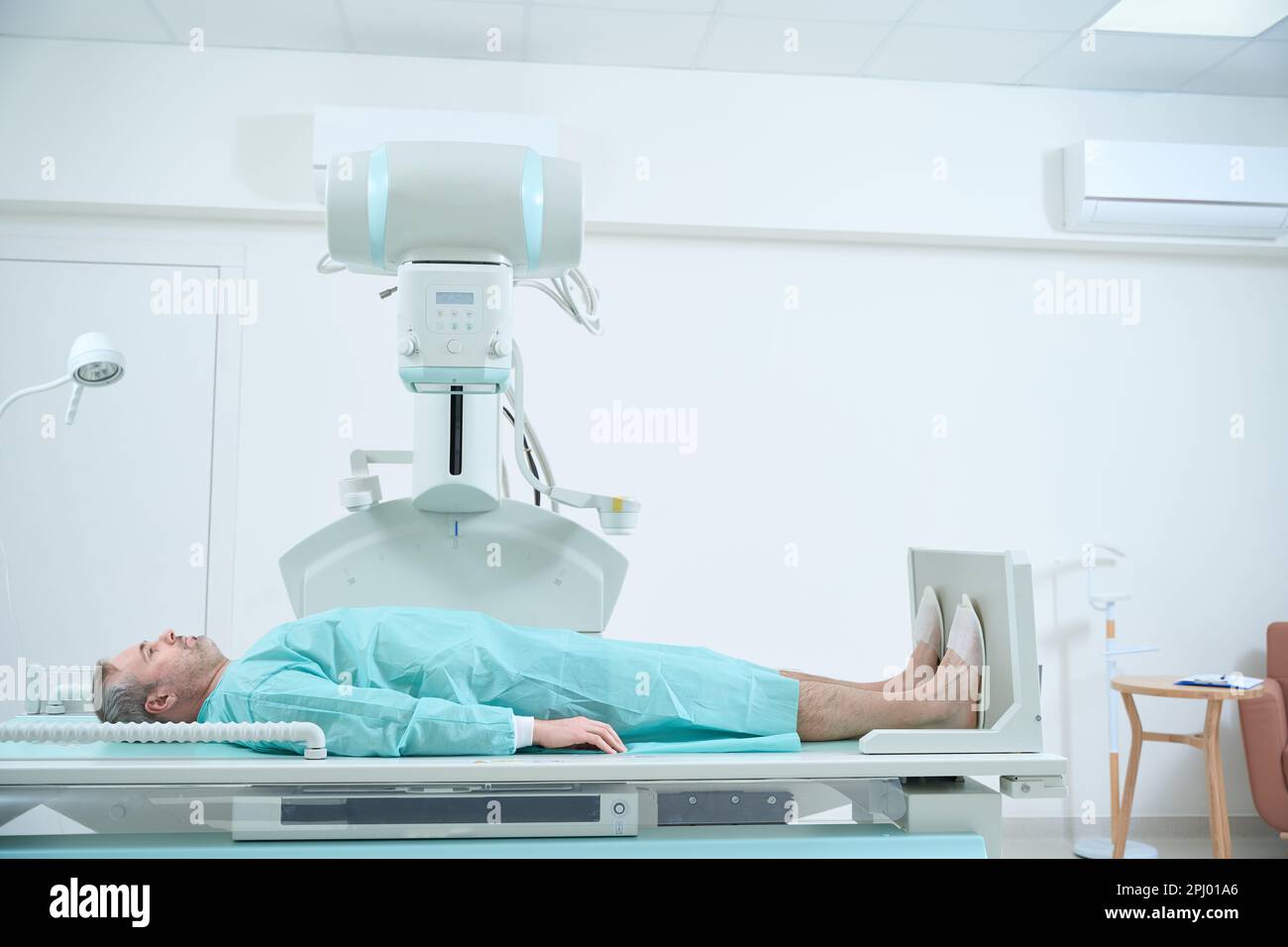 Male patient lying during scanning procedure in clinic Stock Photo - Alamy