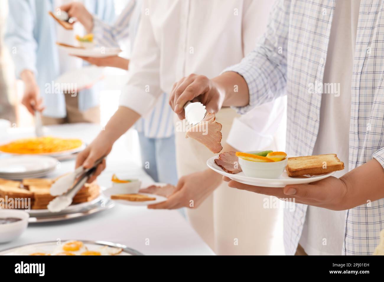 People taking food during breakfast, closeup. Buffet service Stock ...