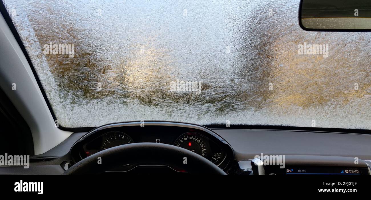 A close-up view of an iced windshield in an interior setting Stock ...