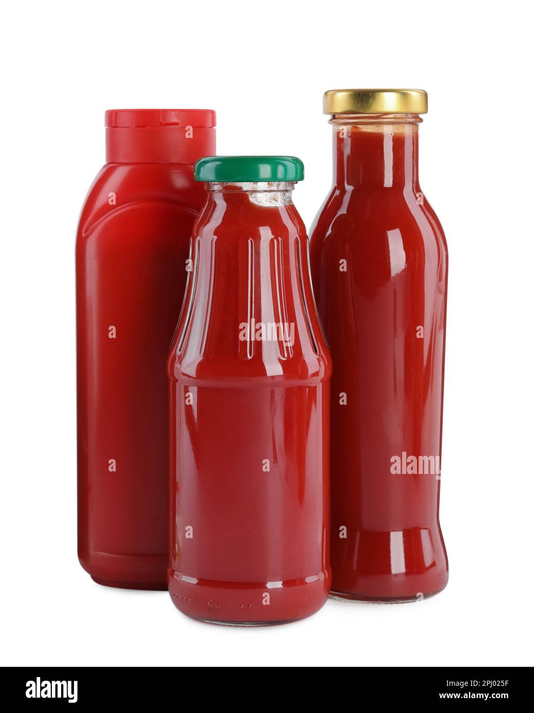 Different bottles of ketchup on white background Stock Photo - Alamy
