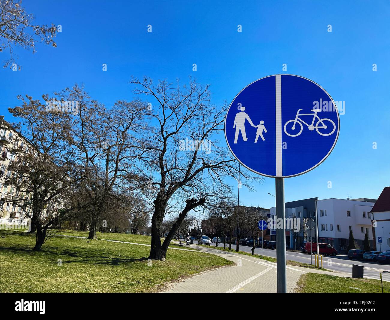Road sign Shared Lane Bicycles and Pedestrians on sunny day Stock Photo ...