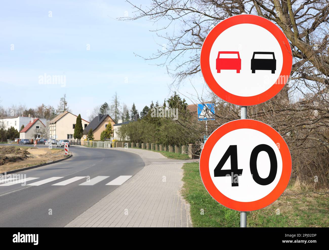 Traffic signs on city street, space for text Stock Photo - Alamy