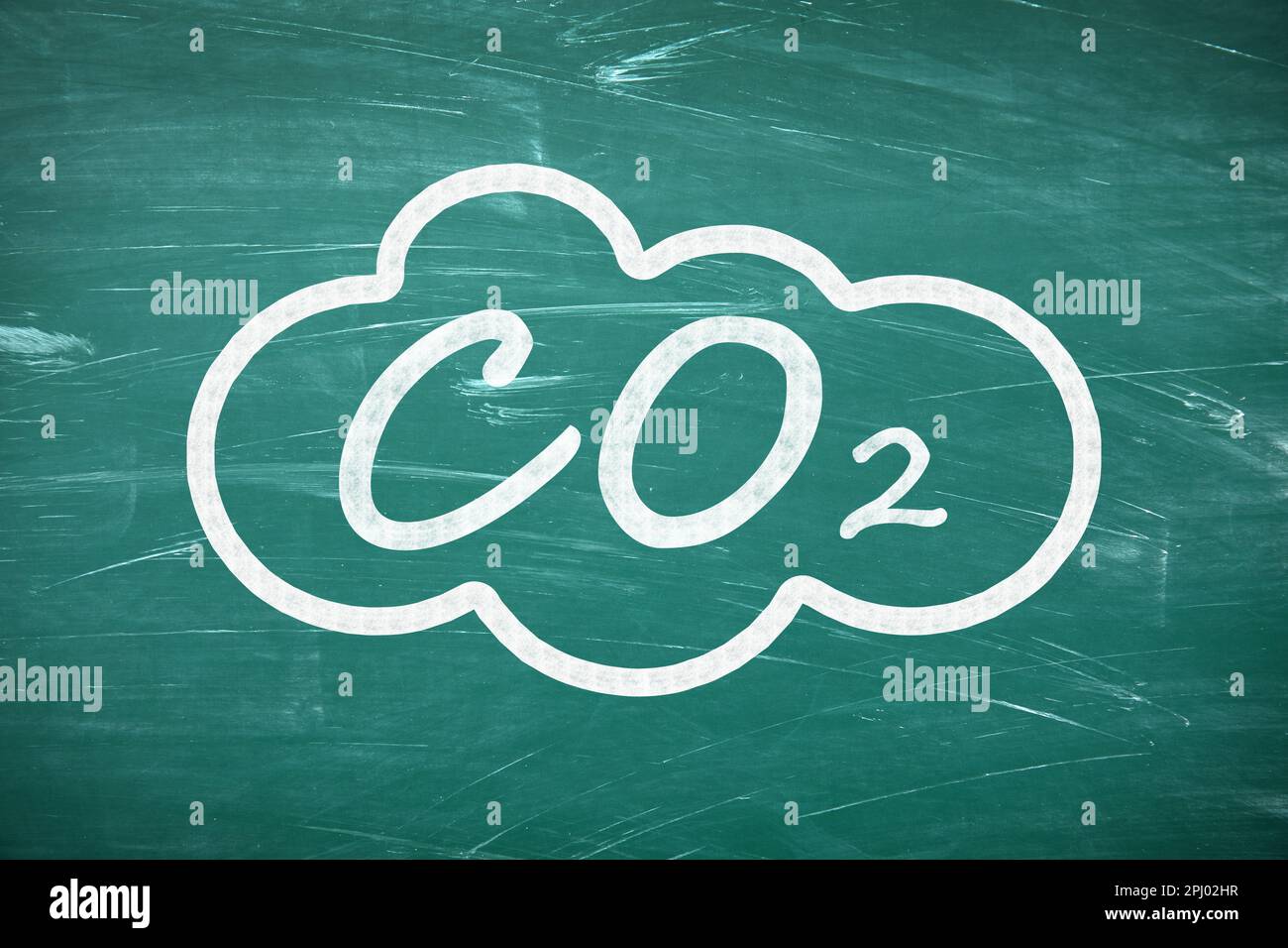 Reduce carbon emissions. Chemical formula CO2 on green chalkboard Stock ...