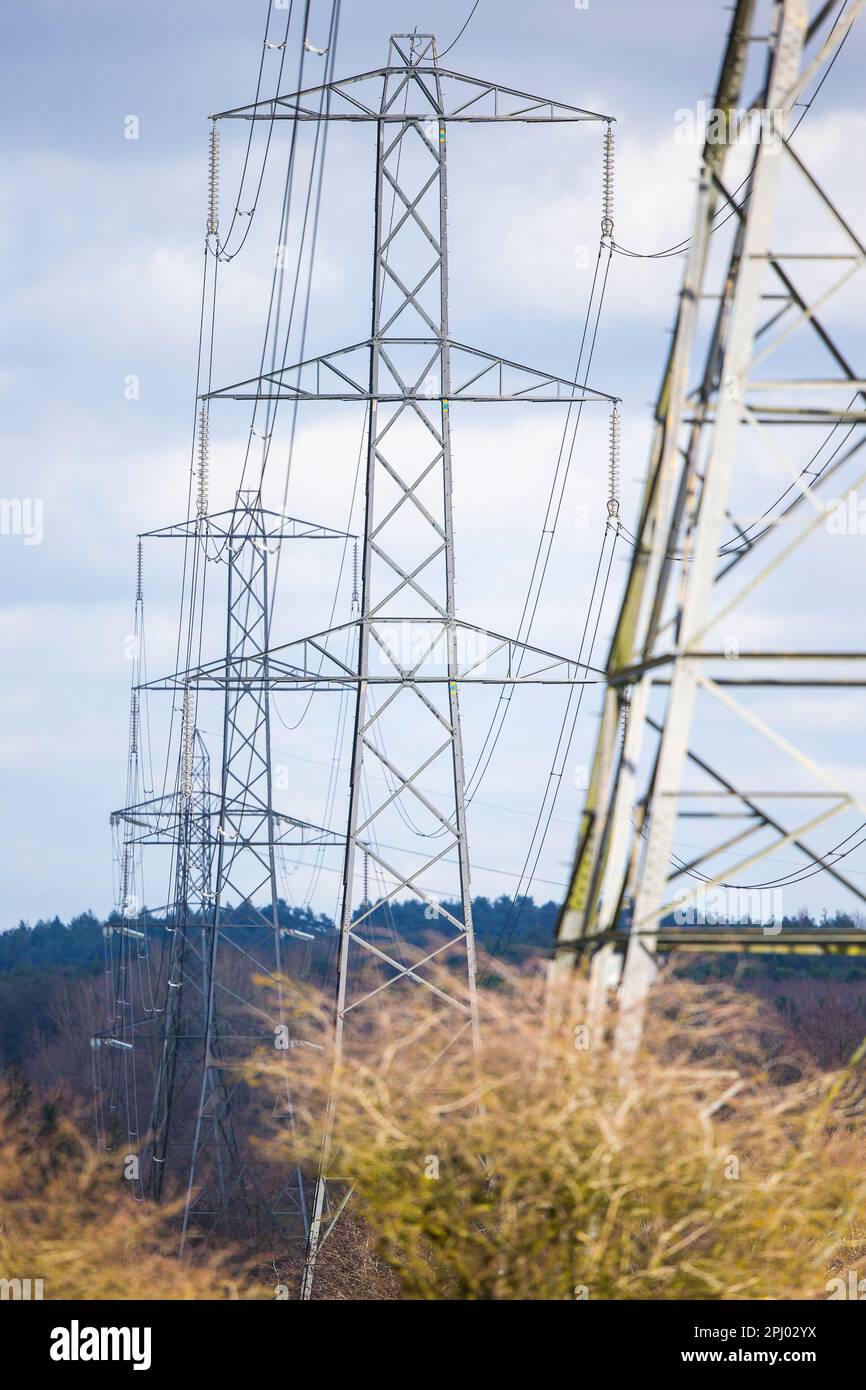 Portrait view of electric power lines on huge, metal, outdoor ...