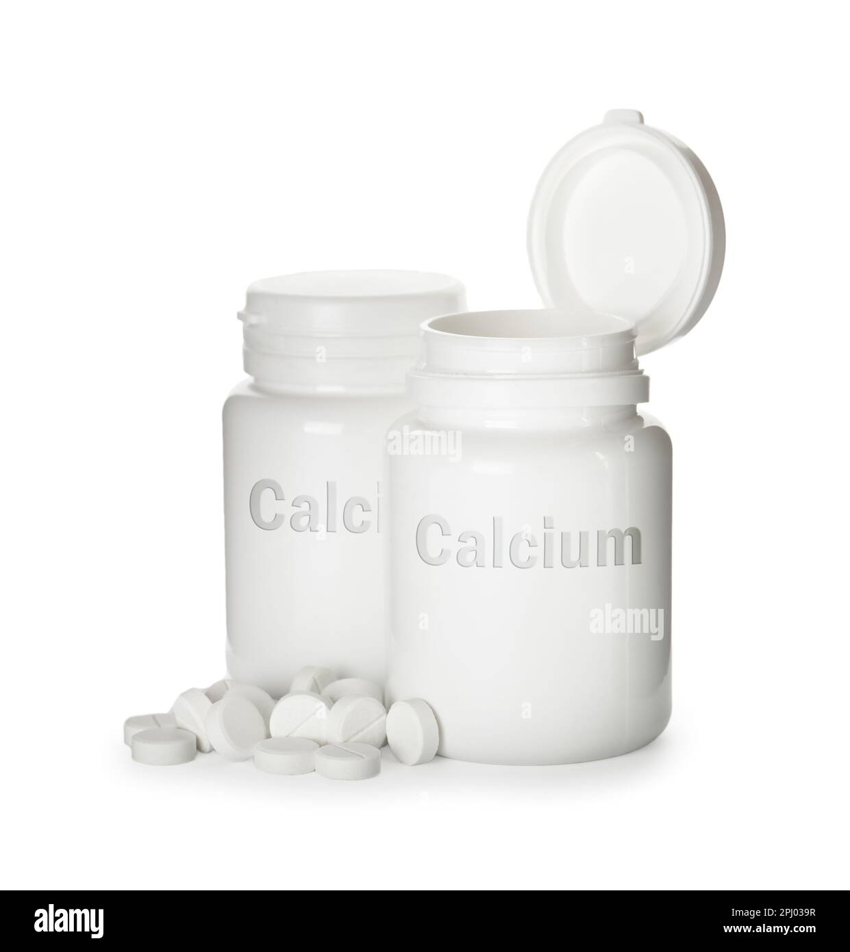 Calcium supplement. Bottles with pills on white background Stock Photo ...
