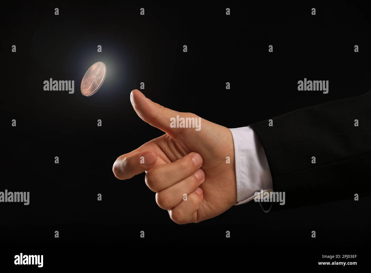 Man throwing coin on black background, closeup. Making decision Stock ...