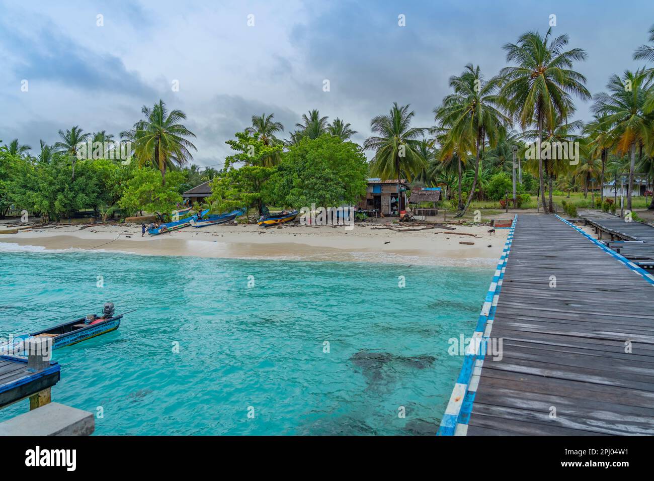 The wooden pier and turquoise sea at Fam island, Raja Ampat, background ...
