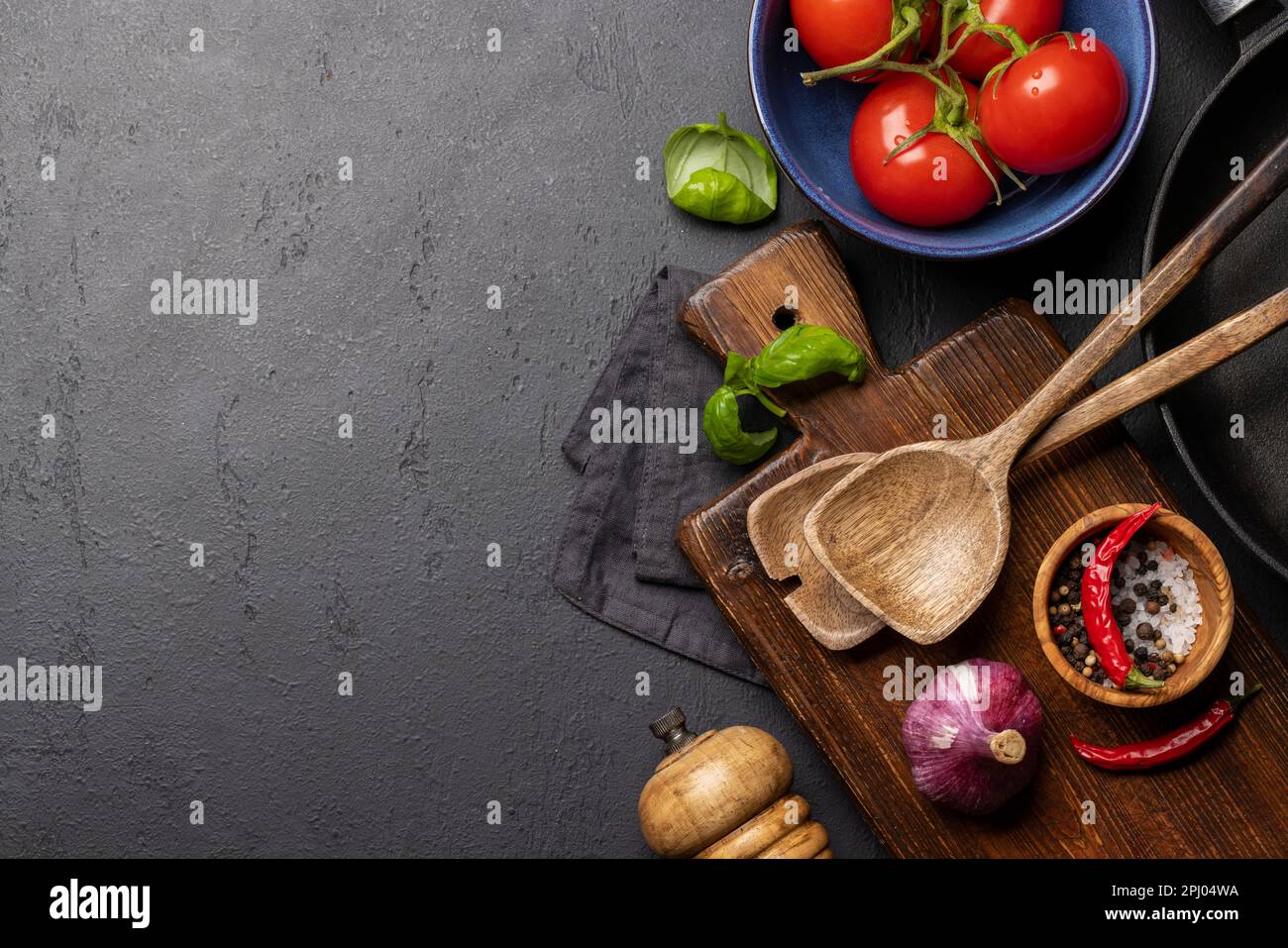 Top-down view of a kitchen table with ingredients, utensils, and copy ...