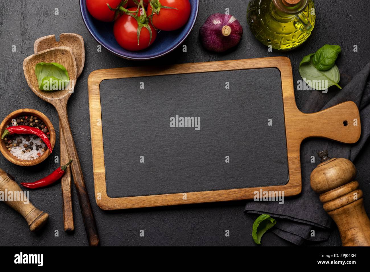 Top-down view of a kitchen table with ingredients, utensils, and ...