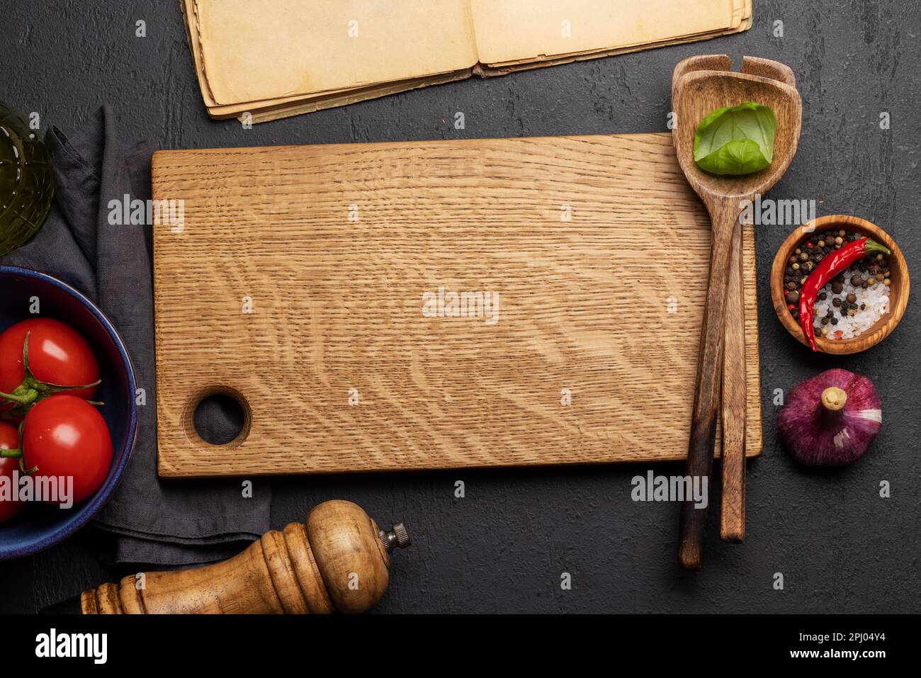 Top-down view of a kitchen table with ingredients, utensils, and ...