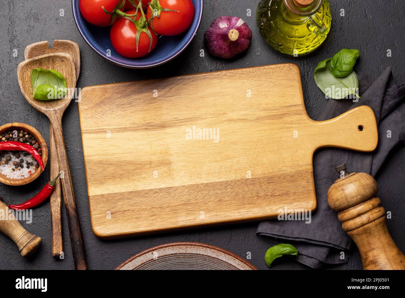 Top-down view of a kitchen table with ingredients, utensils, and ...