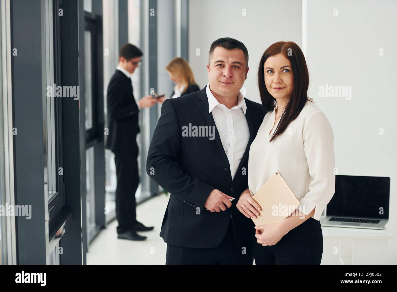 Group of people in official formal clothes that is indoors in the ...