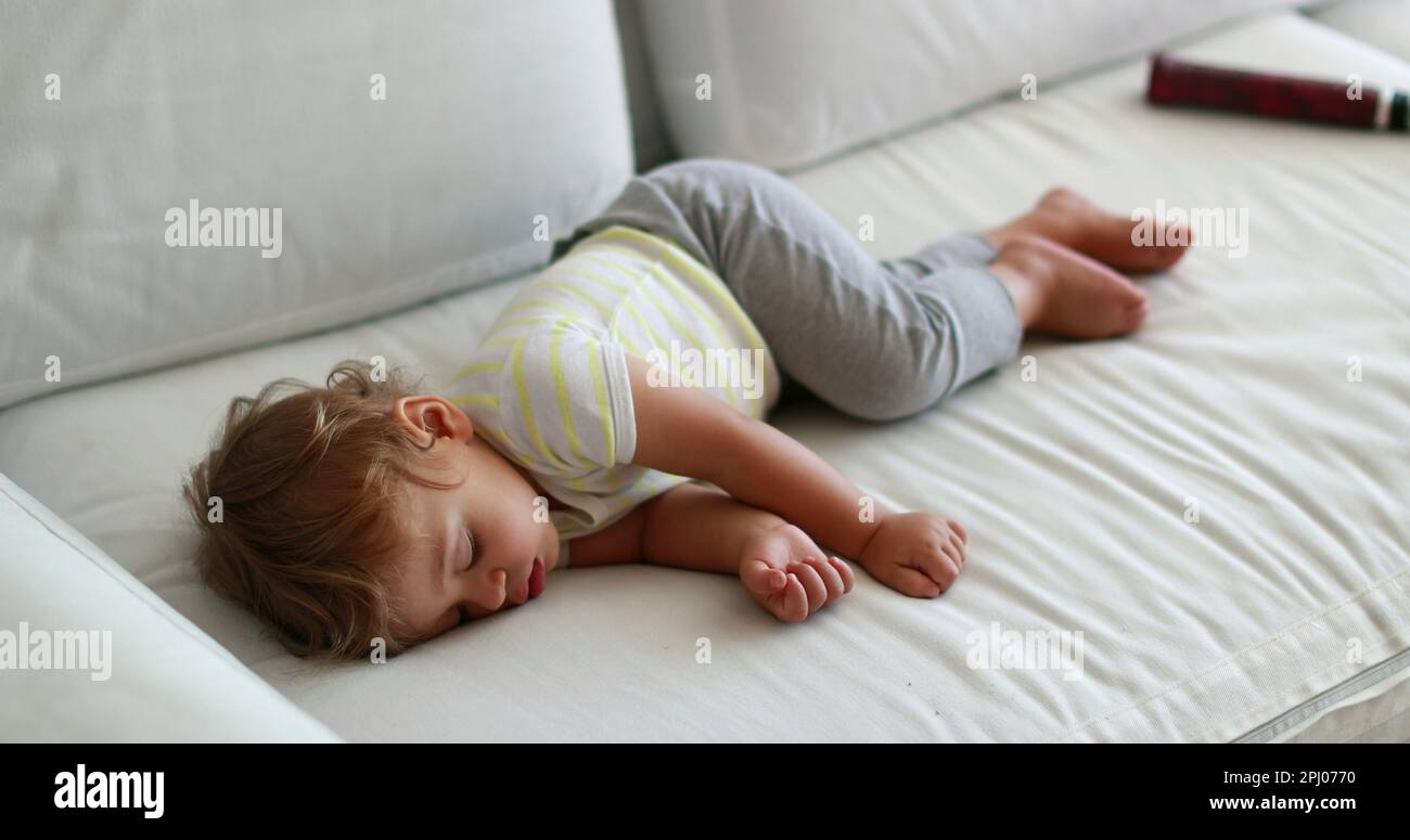 Little baby napping on home couch. Cute infant toddler sleeping ...