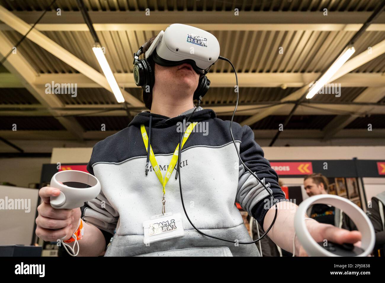 London, UK. 30 March 2023. A visitor plays the virtual reality game ...